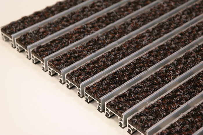 Tapetes de alumínio